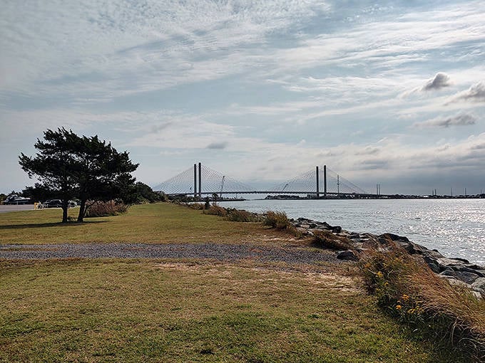 The iconic Indian River Inlet Bridge spans the waters, creating a postcard-worthy scene that photographers flock to capture year-round.