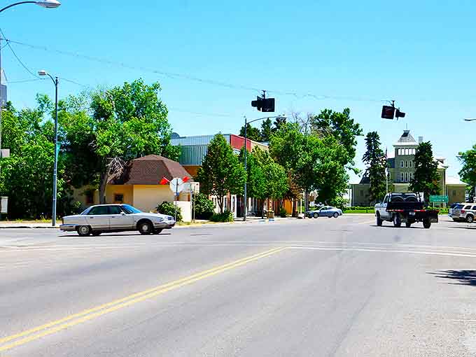 Main Street Choteau welcomes you with classic Americana charm &mdash; highway signs that invite you to slow down and stay awhile.