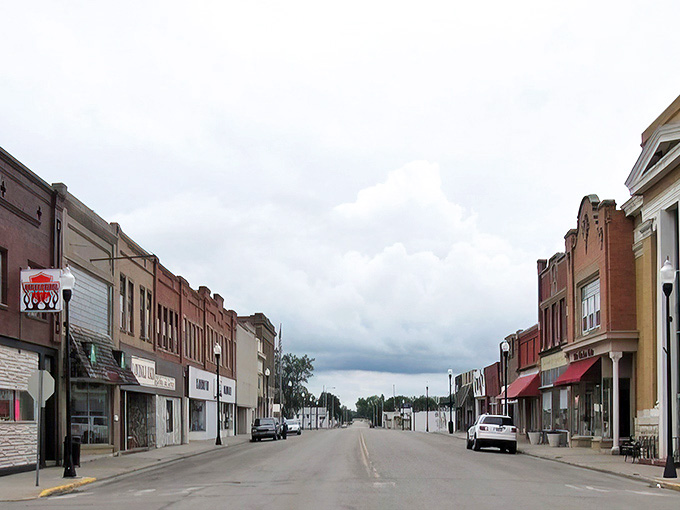 Downtown Carrington on a quiet afternoon – where the only traffic jam might involve a tractor and the occasional indecisive squirrel.