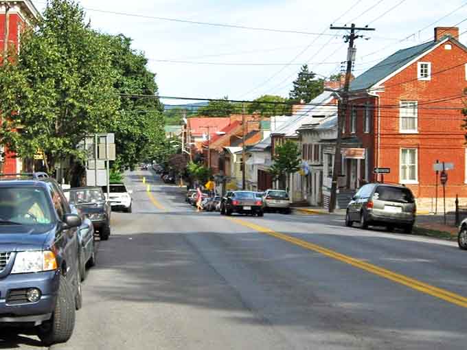 Shepherdstown's sloping streets reveal layers of history with each red-brick building, creating a living timeline you can stroll through on a lazy afternoon.
