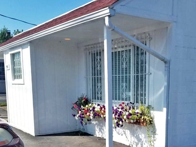 Summer flowers frame this humble white building that houses some of Akron's most legendary pancakes. Simplicity at its most delicious.