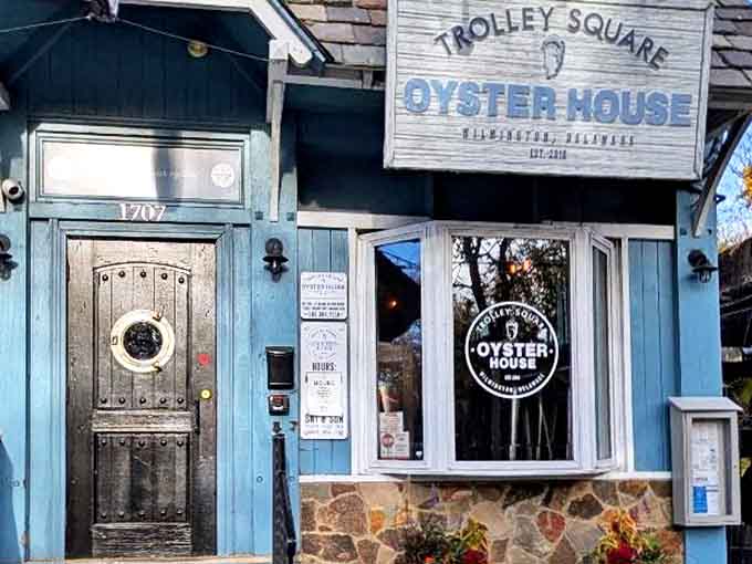 The weathered blue exterior and nautical door with porthole window promise seafood adventures before you've even stepped inside this Wilmington gem.