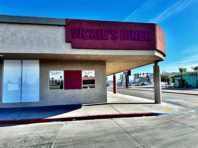 The corner entrance says "no-nonsense diner," but the pink signage hints at the personality waiting inside. Like Vegas itself &ndash; practical with a flash of color.