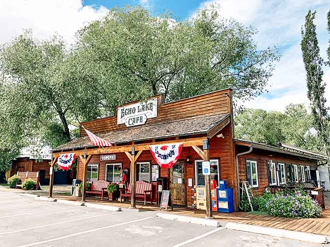 The quintessential Montana roadside cafe, where rustic charm meets hearty comfort food under the watchful gaze of towering trees.