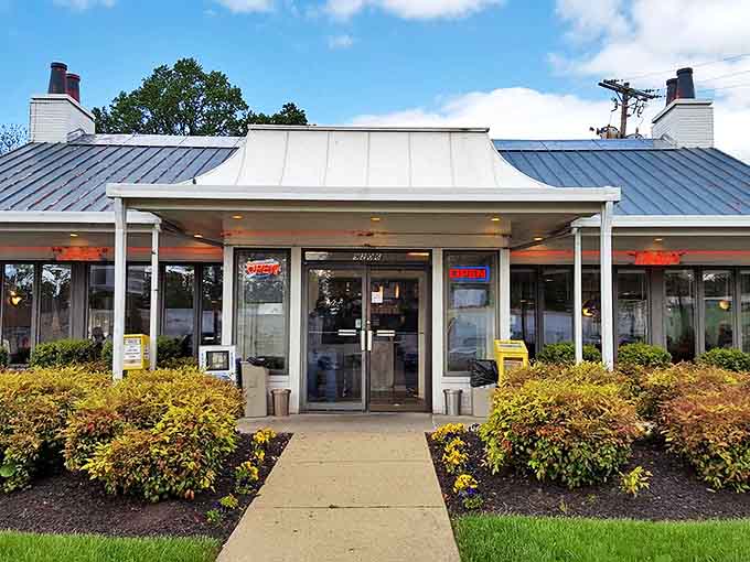 The silver-topped sanctuary of comfort food beckons with its unpretentious charm and neon "OPEN" sign promising delicious possibilities inside.
