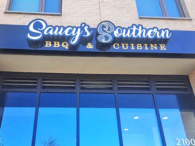 The brick-and-mortar promise of smoky delights to come. Saucy's exterior beckons with its bold signage, like a BBQ bat signal for the hungry and hopeful.