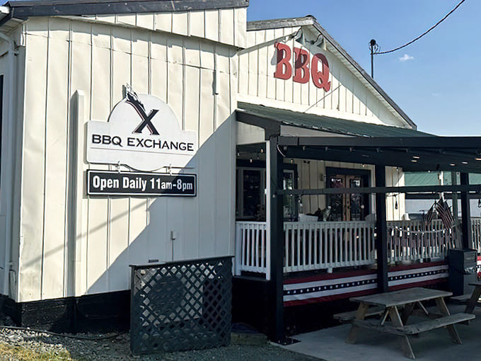 The white clapboard exterior with that simple "BBQ" sign is like a beacon of smoky promise in Gordonsville. No fancy frills needed when the food speaks this loudly.