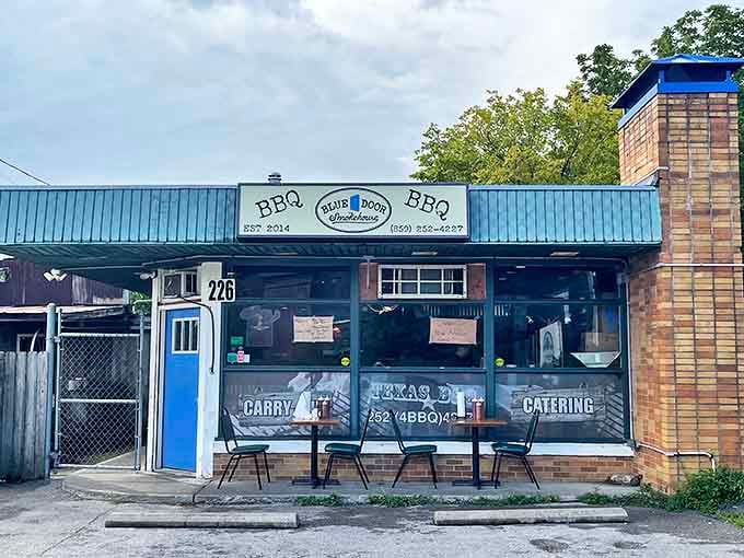 That iconic blue door isn't just a color choice&mdash;it's a portal to barbecue nirvana hiding in plain sight on Lexington's Walton Avenue.