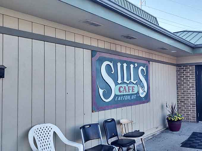 The unassuming facade of Sill's Cafe stands like a time capsule in Layton, promising comfort food that's outlasted countless food trends and fad diets.