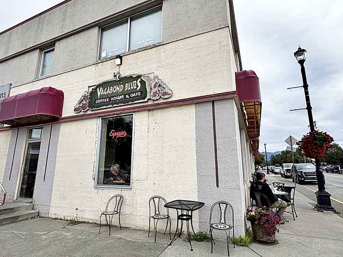 That maroon awning isn't just a splash of color in Palmer—it's a beacon for caffeine-seekers and sandwich enthusiasts alike. Vagabond Blues stands out like a flamingo in a penguin parade.