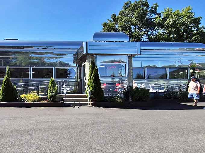 The gleaming stainless steel exterior isn't just eye-catching&mdash;it's a time machine disguised as architecture. Classic Americana at its finest.