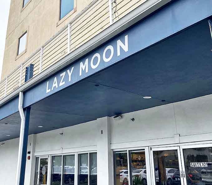 Lazy Moon's storefront combines modern simplicity with a splash of Florida greenery &ndash; the calm before the pizza storm.