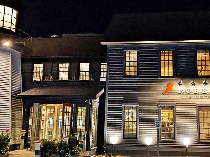 The iconic blue exterior of Robert's Maine Grill stands like a beacon for seafood lovers, promising maritime delights within those New England clapboard walls.