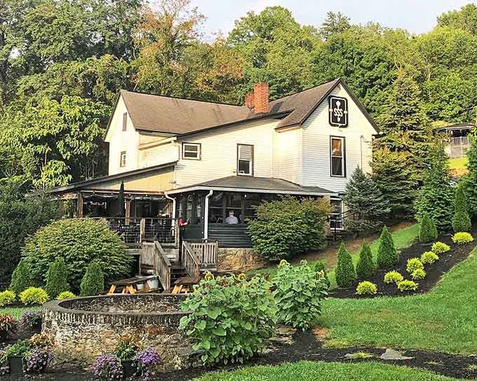 This picturesque farmhouse-turned-restaurant could double as a Norman Rockwell painting come to life, complete with wraparound porch perfect for post-hike refueling sessions.