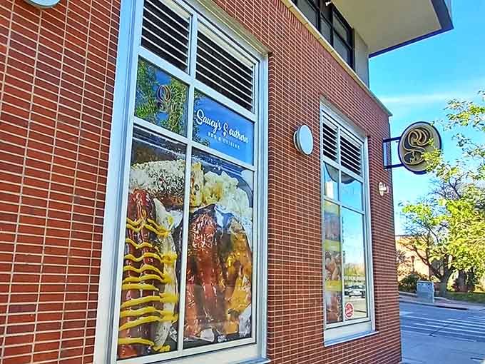 The brick-and-mortar promise of smoky delights to come. Saucy's exterior beckons with its bold signage, like a BBQ bat signal for the hungry and hopeful.