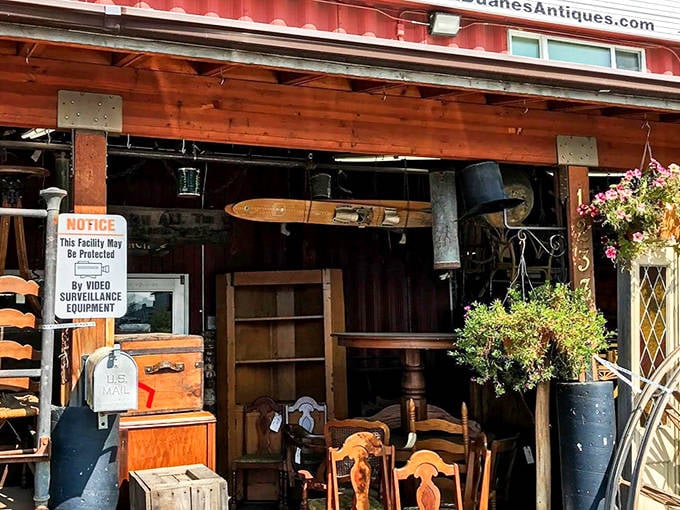 The iconic orange-topped exterior of Duane's Antique Market beckons treasure hunters with the promise of discoveries that can't be found on Amazon.