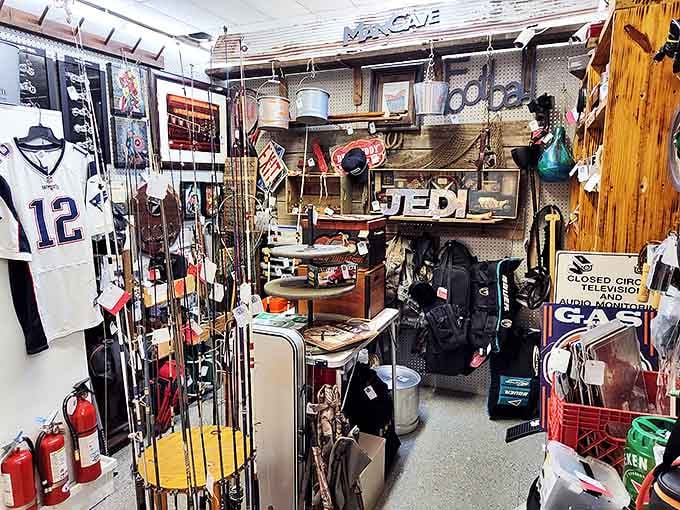 Fishing rods, sports jerseys, and a "JEDI" sign? This booth proves that in the antique universe, the Force of collecting is strong.