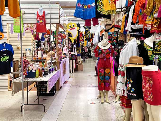 Mannequins modeling a fiesta of colors and patterns &ndash; where traditional embroidery meets modern style in an aisle that feels like walking through a living cultural celebration.