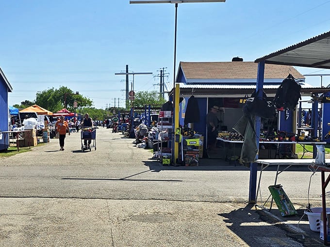 The blue entrance booth welcomes bargain hunters into this sprawling wonderland of secondhand splendor and surprises.
