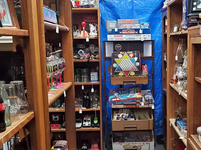 Board games, glassware, and vintage treasures create a perfect nook for those seeking both nostalgia and practical finds.