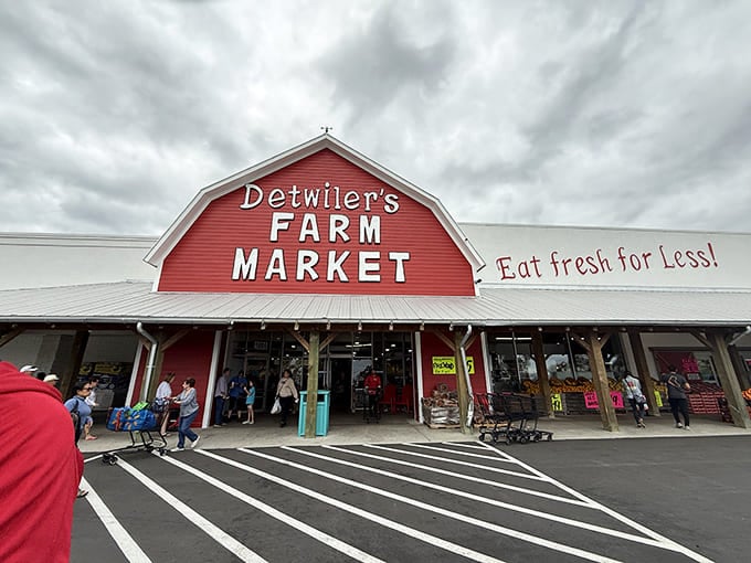 Rain clouds gather but can't dampen the spirits of shoppers heading into this produce paradise. The red barn beckons like a lighthouse for the culinarily shipwrecked.