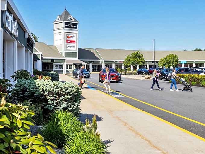 The iconic tower of Kittery Premium Outlets stands like a retail lighthouse, guiding bargain hunters safely to shore through seas of full-price merchandise.