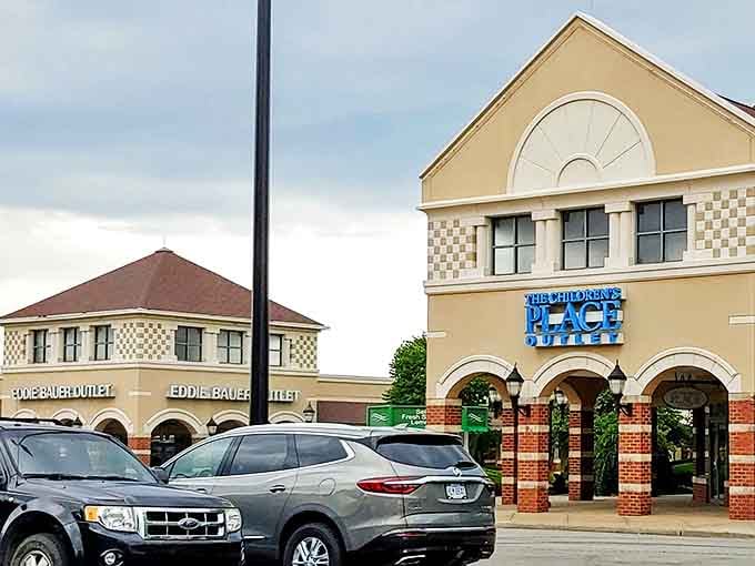 The Children's Place and Eddie Bauer stand like retail sentinels, guarding treasures that somehow look more expensive than the prices you'll actually pay for them.