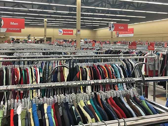Rainbow racks of possibility! The clothing section at Savers is meticulously organized by size and color, turning secondhand shopping into a treasure hunt.