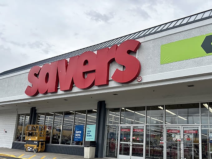 The iconic red Savers sign stands out like a beacon of bargain-hunting hope, promising treasures within for those brave enough to explore.