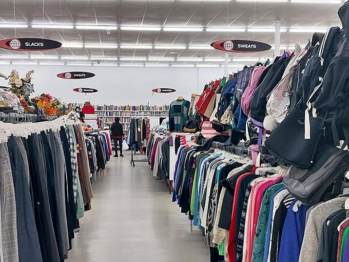 Organized chaos at its finest! Value World's clever overhead signage system guides you through a treasure hunter's paradise where "Slacks" and "Sweats" are just the beginning of your thrifting adventure.
