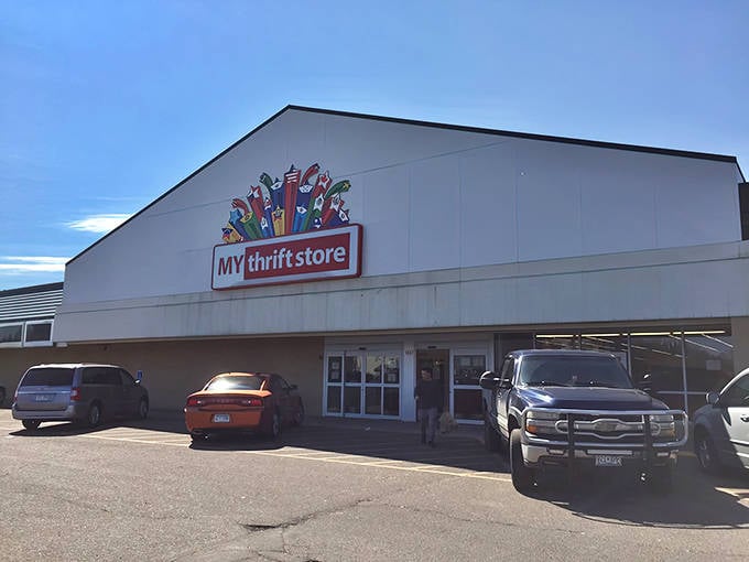 The colorful, welcoming facade of MyThriftStore in St. Paul beckons bargain hunters with its vibrant signage and unassuming exterior.