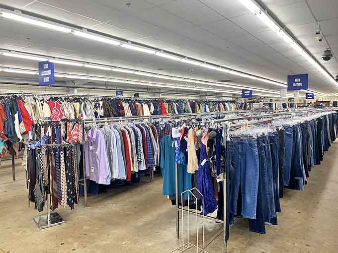 Rows upon rows of fashion possibilities await! The men's section stretches toward the horizon like a denim-filled promised land.