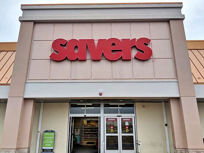 The bright red lettering against beige brick announces what savvy Rhode Islanders already know: adventure awaits inside, no passport required.