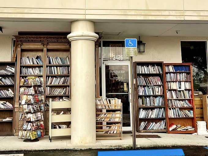 Books spill onto the sidewalk outside Old Florida Book Shop, tempting passersby with literary treasures before they even enter.