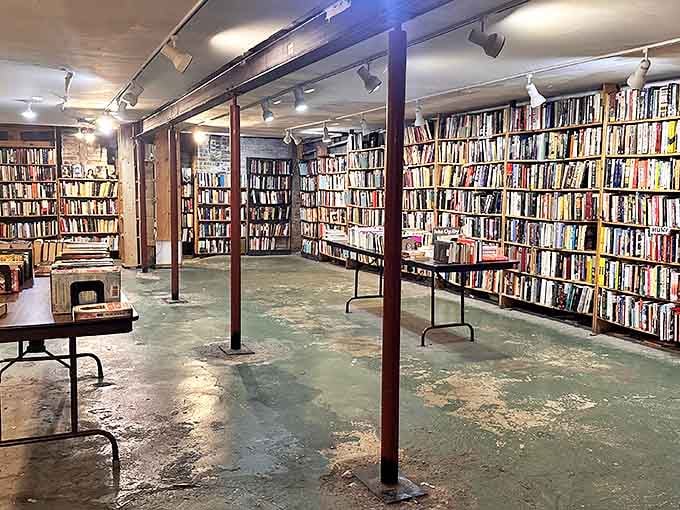 Wooden shelves stretch toward infinity in Myopic's basement level, where hidden literary treasures await curious explorers in every aisle.