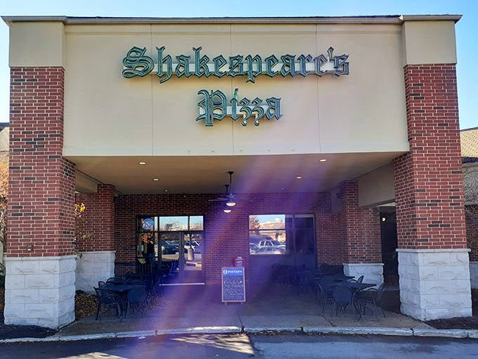 The iconic green glow of Shakespeare's Pizza sign welcomes hungry visitors like a beacon of cheesy hope in Columbia's culinary landscape.