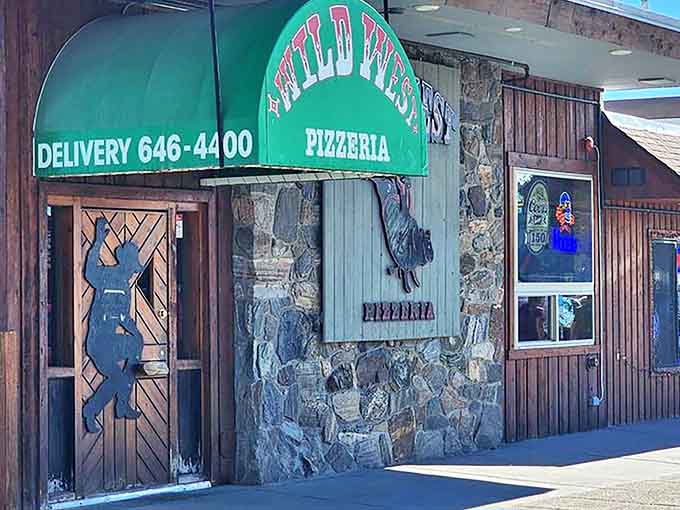 The perfect marriage of stone and wood creates a frontier-worthy facade that says, "Partner, the best pizza in the territory awaits inside."
