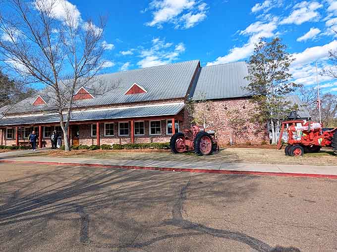 Winter's bare trees can't hide this culinary landmark where two faithful tractors stand sentinel, ready to welcome hungry pilgrims to barbecue paradise.
