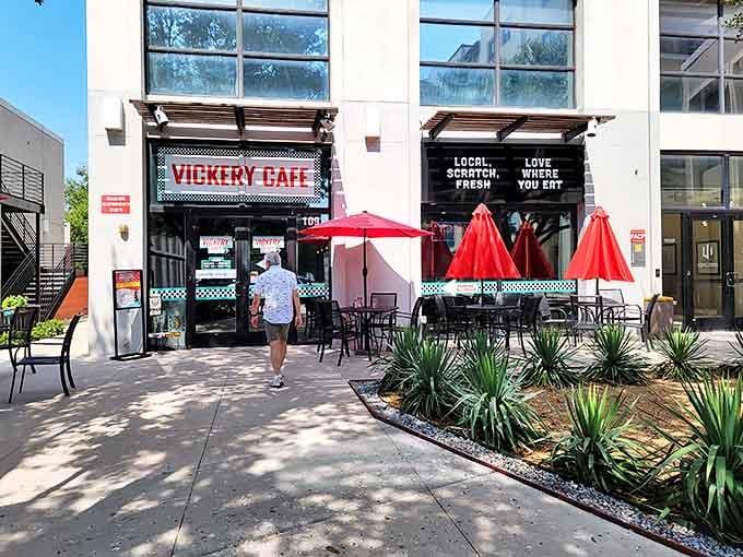 Red umbrellas dot the patio like cherry tomatoes on a salad, inviting you to enjoy your freshly squeezed orange juice in the Texas sunshine.