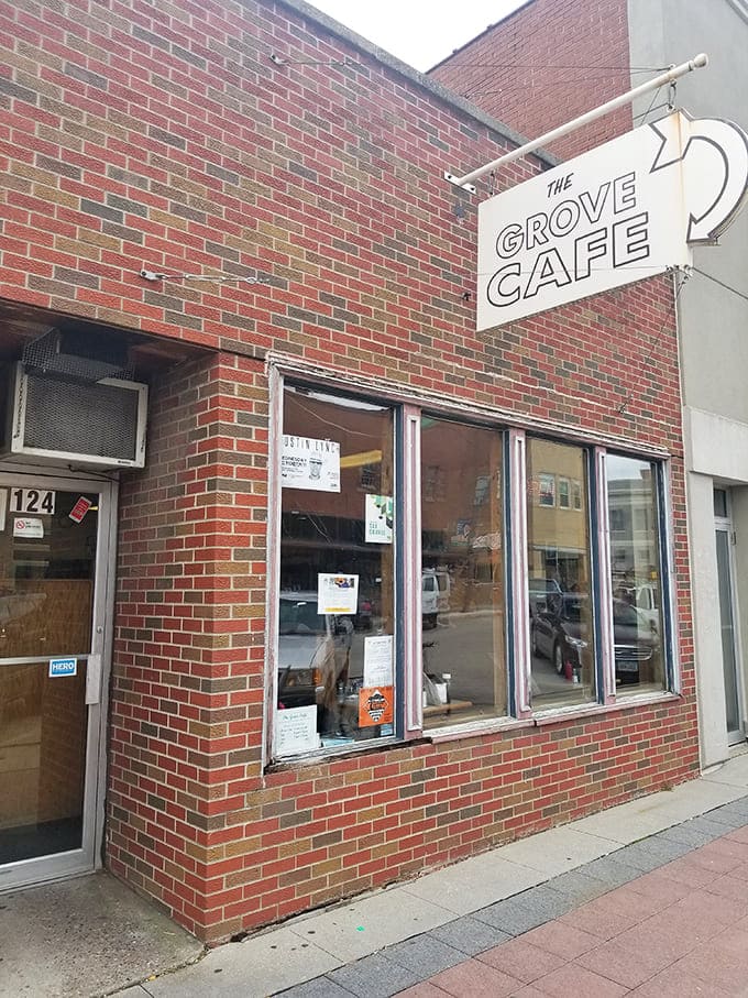 The unassuming brick exterior of The Grove Cafe proves once again that culinary treasures often hide behind the most modest facades.