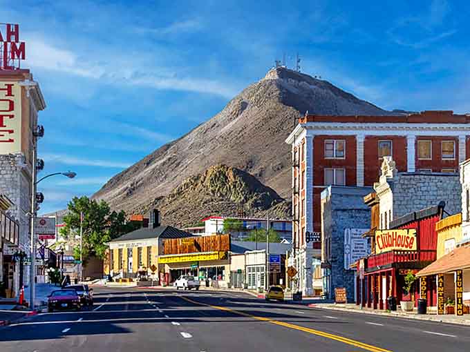 Downtown Tonopah glows in golden hour light, showcasing a streetscape that hasn't changed much since the days when miners with dusty boots walked these same sidewalks.