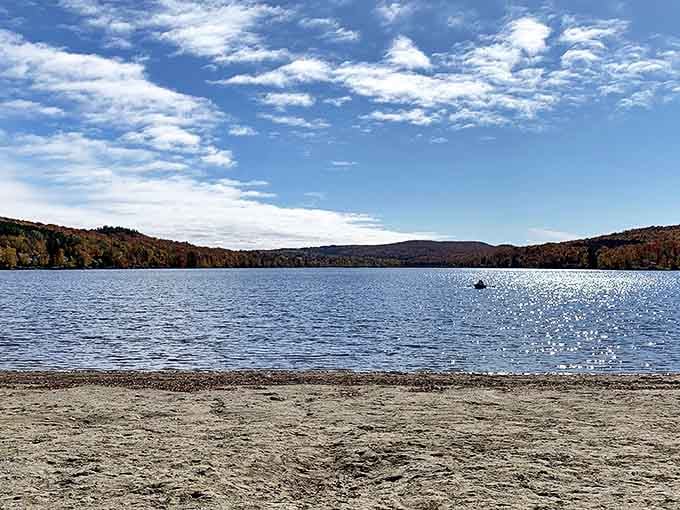 Fall foliage reflected in Lake Elmore's mirror-like surface &ndash; Mother Nature showing off her painting skills with a palette that would make Monet jealous.