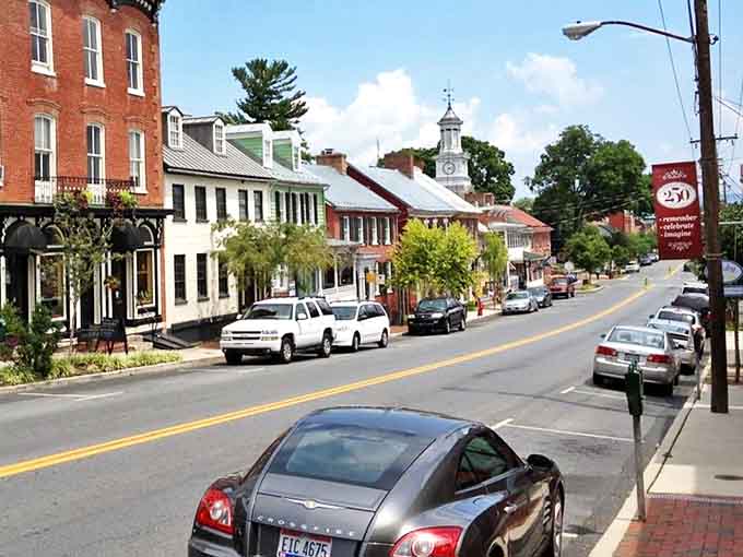 German Street stretches before you like a living history book, where brick buildings and that iconic clock tower create Shepherdstown's storybook charm.
