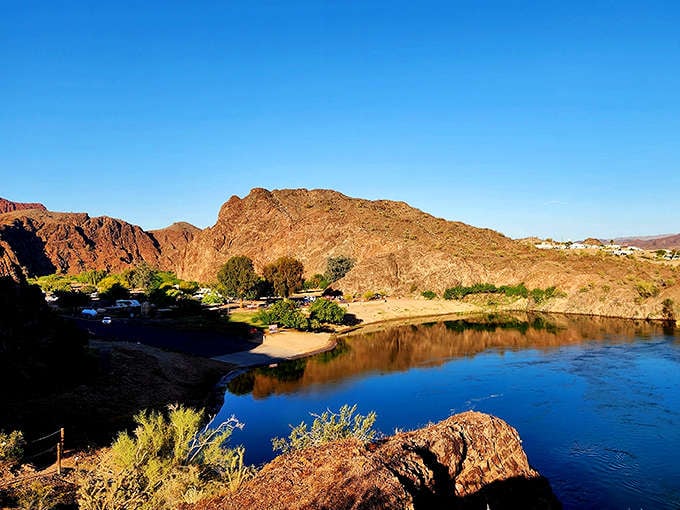 Where rugged mountains meet tranquil waters, River Island State Park creates nature's perfect contradiction. Desert peaks reflect in the Colorado River's blue mirror.