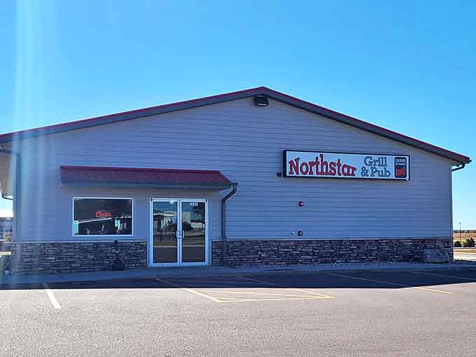 The unassuming exterior of Tinners Public House North might fool you, but those red umbrellas are practically semaphore flags signaling "deliciousness ahead!"
