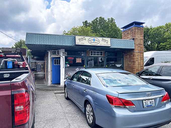 That iconic blue door isn't just a color choice&mdash;it's a portal to barbecue nirvana hiding in plain sight on Lexington's Walton Avenue.