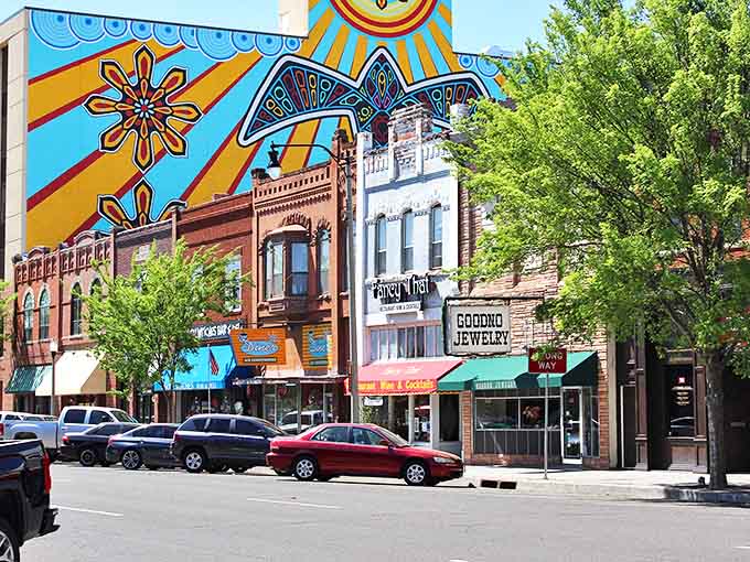 Downtown Norman's colorful murals transform brick buildings into an outdoor art gallery. Sunshine and creativity collide in this vibrant streetscape.