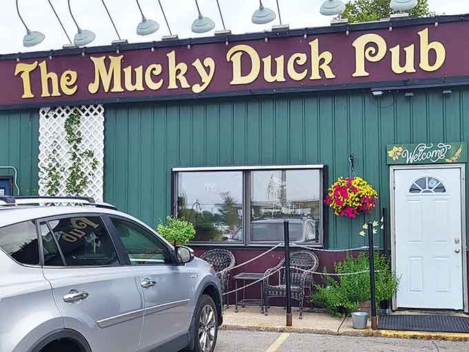 Colorful hanging baskets frame the entrance like a countryside English pub, proving that British charm can bloom beautifully in Midwestern soil.