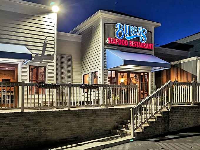 As evening falls, Bubba's neon glow transforms from casual eatery to waterfront beacon. It's like the building itself is saying, "Dinner is served, and it's going to be spectacular."
