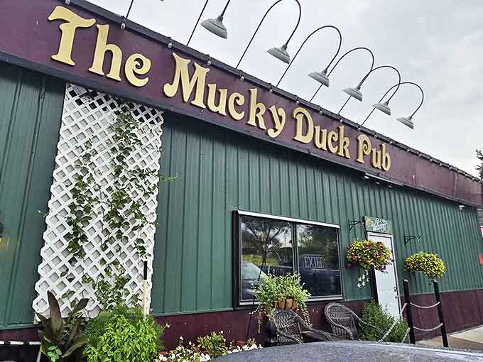 The distinctive burgundy and green exterior might not scream "gourmet destination," but as any seasoned traveler knows, the most memorable meals often hide behind modest doors.